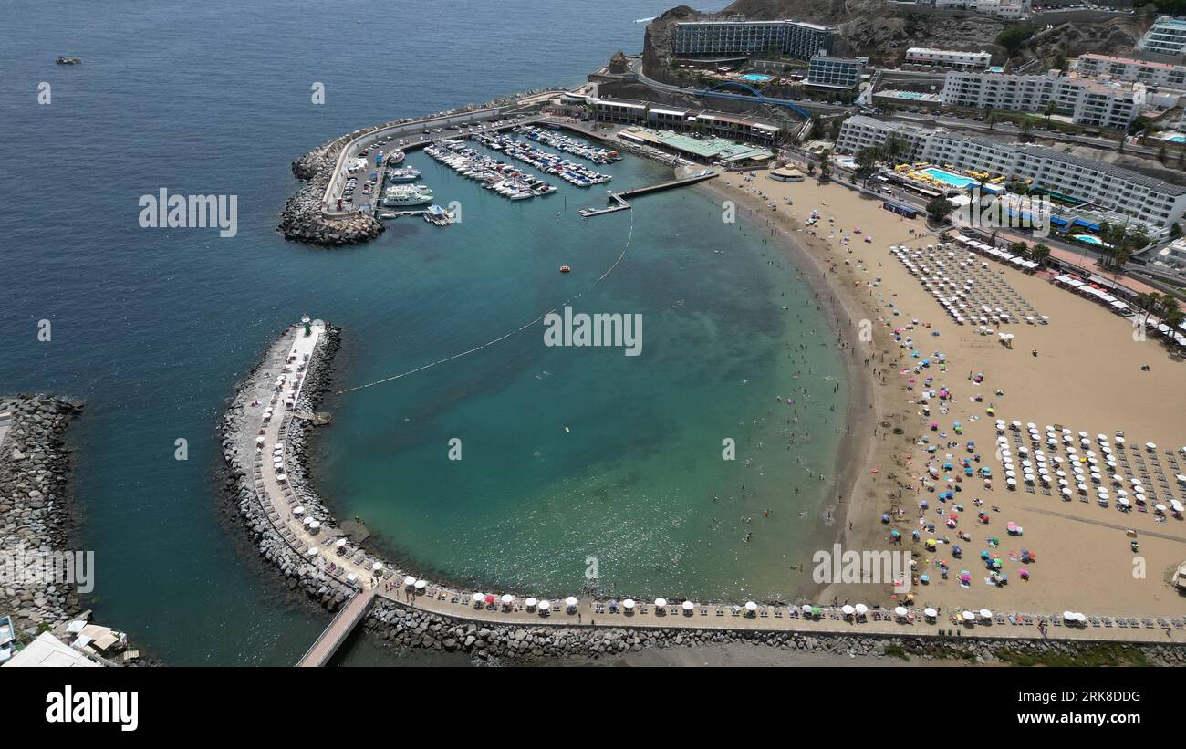 Aerial view of a seaside town with a bustling beach and marina Stock ...