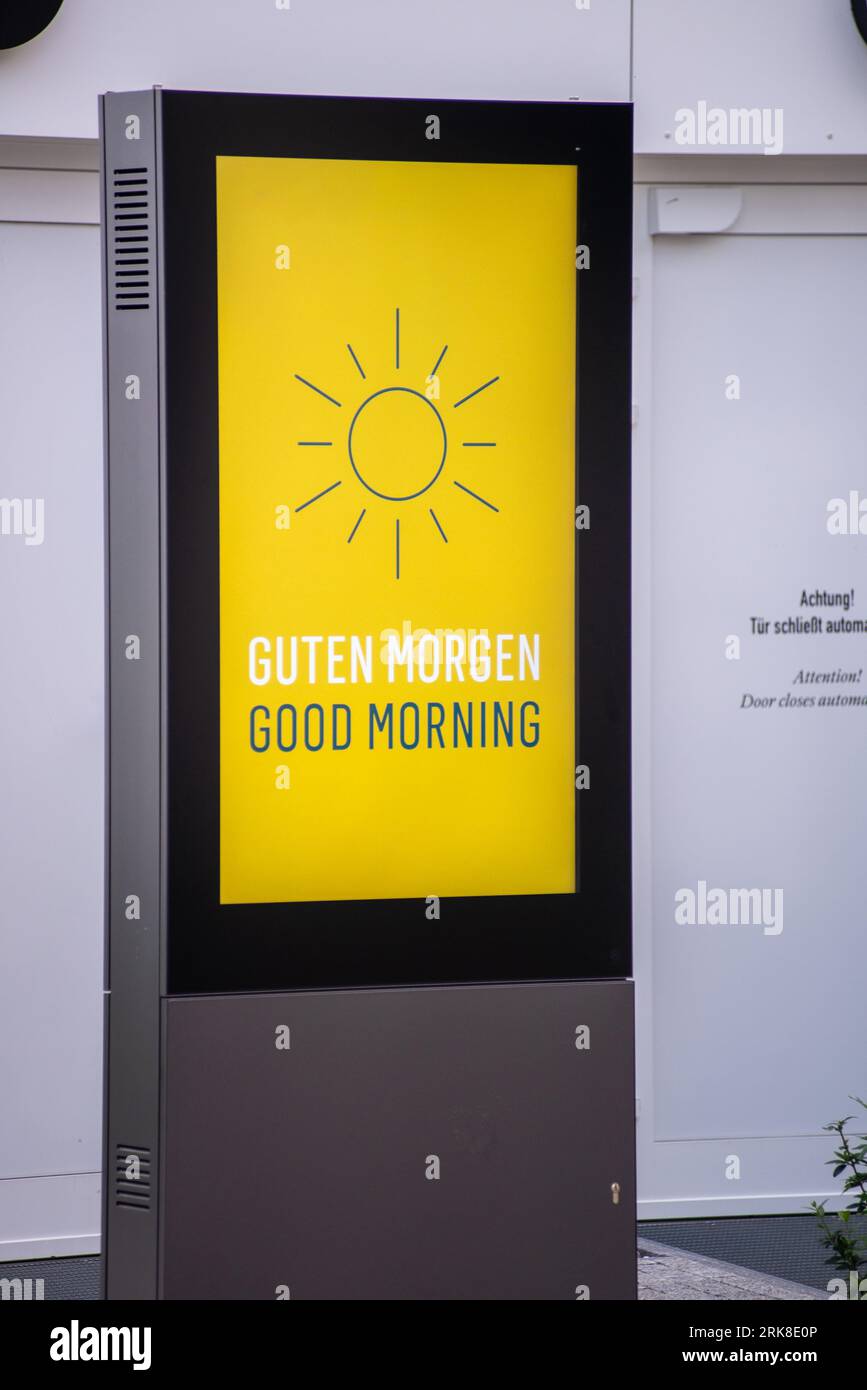 Illuminated ad in a beach wishing good morning Stock Photo - Alamy