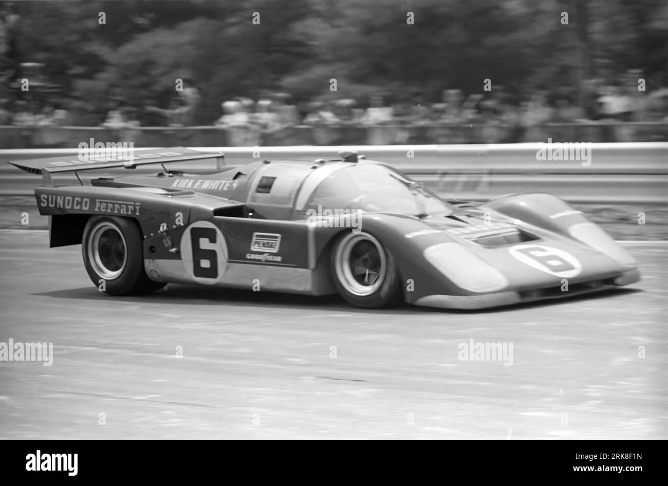 Mark Donohue in a Penske Sunoco Ferrari 512M during a pit stop at the ...