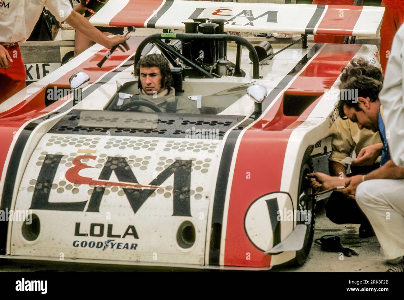 Jackie Stewart in the pits in the Carl Hass Racing Lola T260 at the 1971 Watkins Glen Can-Am ...