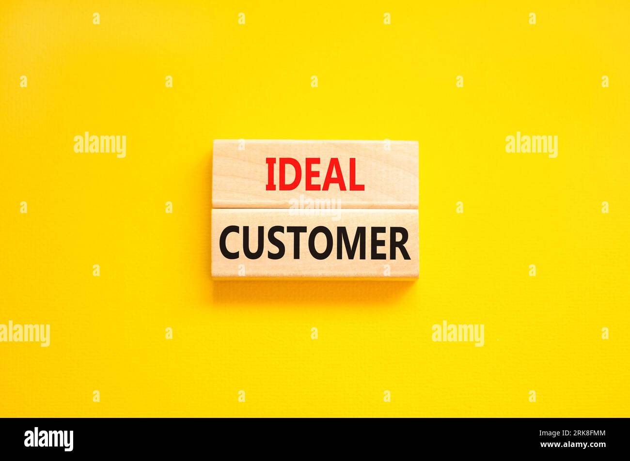 Ideal customer symbol. Concept words Ideal customer on beautiful wooden ...