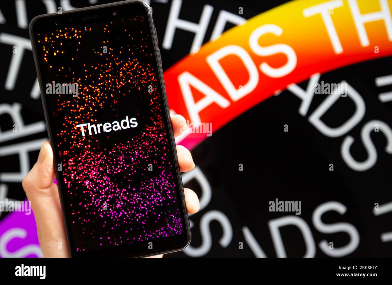 Ukraine, Odesa - July, 7 2023: Hand holding mobile with Threads app ...