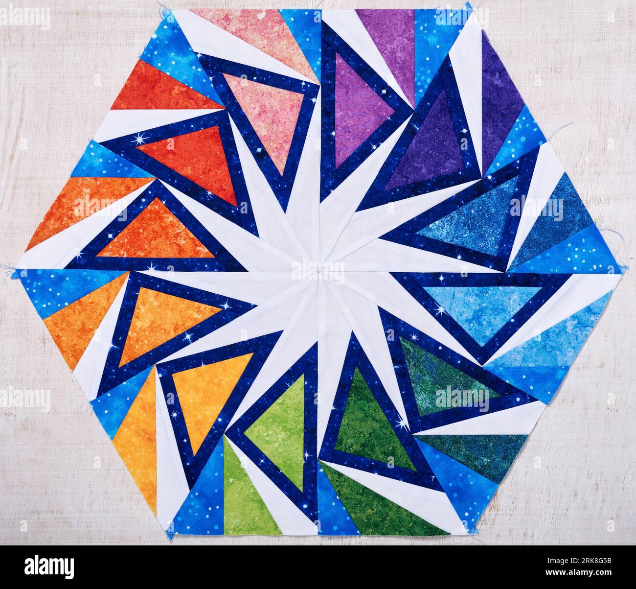 Hexagon patchwork block like kaleidoscope from pieces of fabrics ...