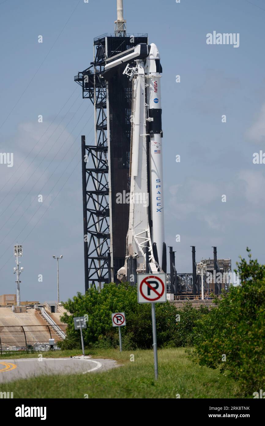 A SpaceX Falcon 9 rocket stands ready for launch on pad 39A at the ...