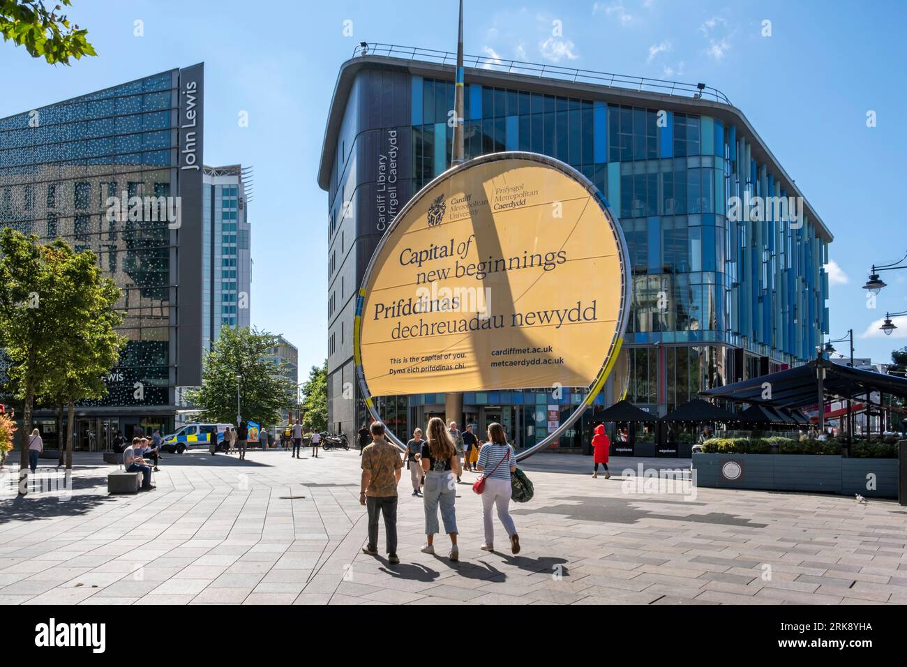 People walking into Cardiff City Centre on a bright summer day Stock ...