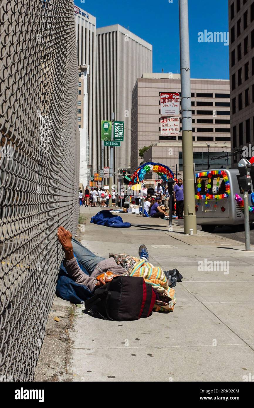 San Francisco, California, 2016. Two homeless persons lying on the ...