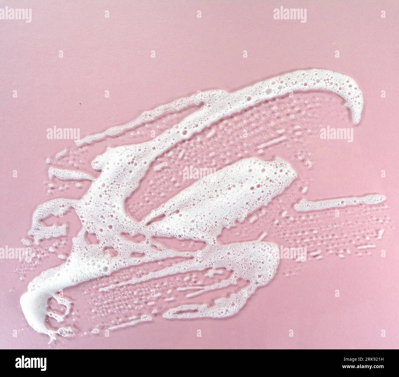 Foam swatch on a pink background. Soapy liquid texture with bubbles ...