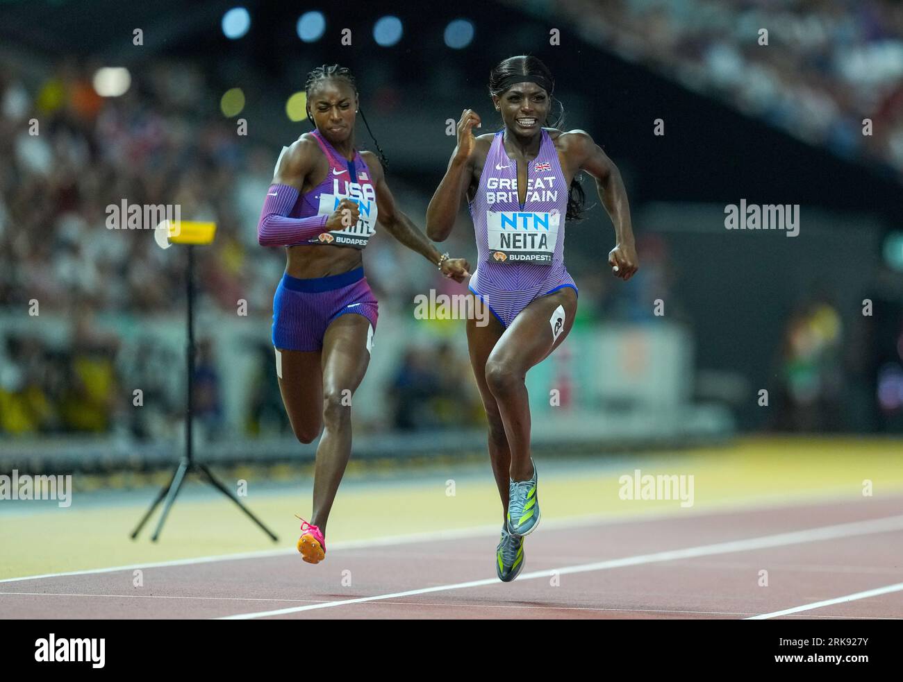 Great Britain’s Daryll Neita (right) and USA’s Kayla White compete in ...