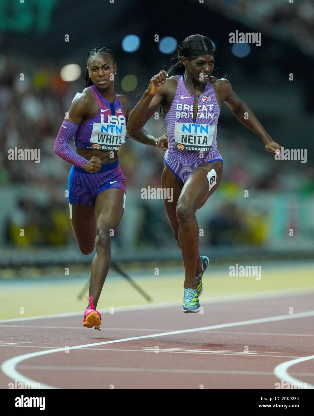 Great Britain’s Daryll Neita (right) and USA’s Kayla White compete in ...