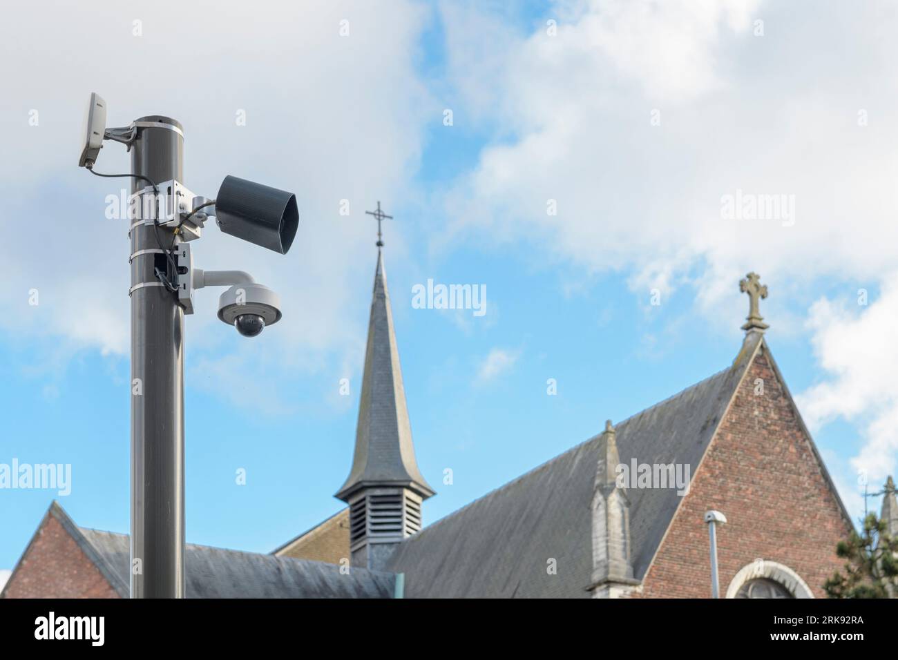 External video surveillance camera on the background of the church ...