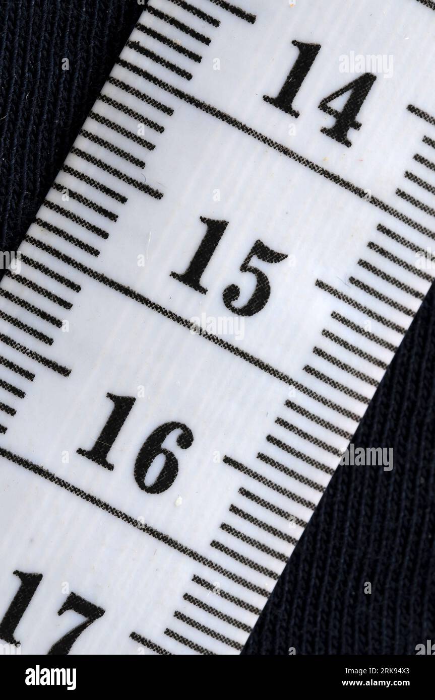 Fibre-glass tape measure for sewing and dress making Stock Photo - Alamy