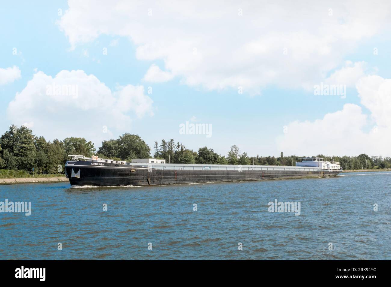 Cargo barge sailing along hi-res stock photography and images - Alamy