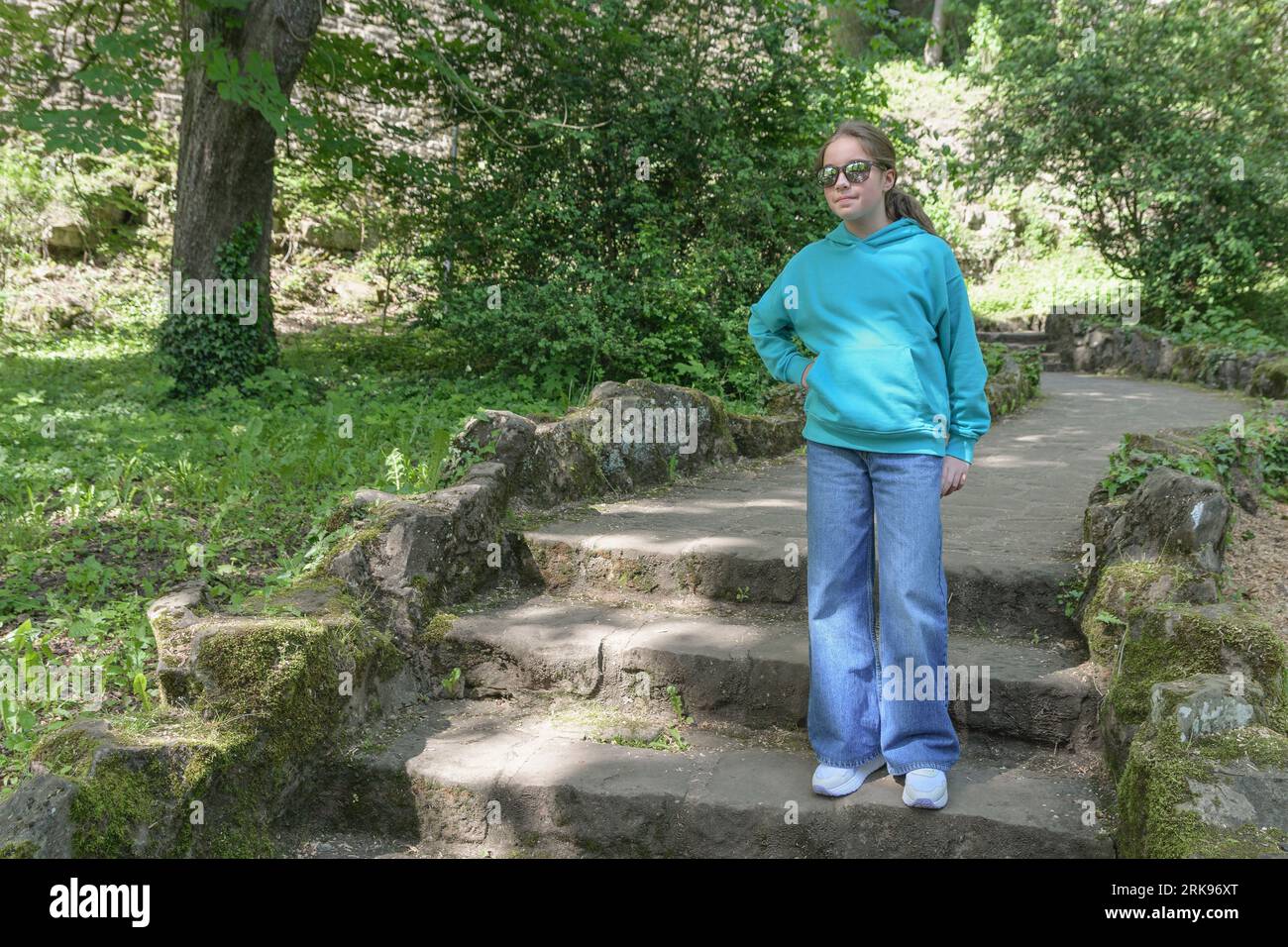 Walk in the park. Lifestyle, Teenage girl in walking clothes of modern ...