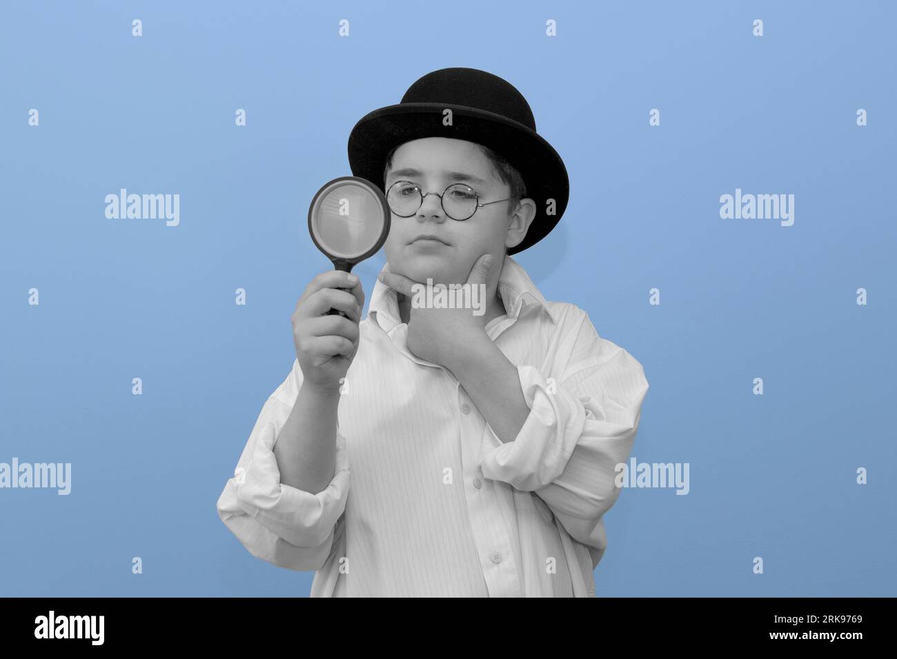 Young detective. Black and white retro portrait of a boy in 1920s ...