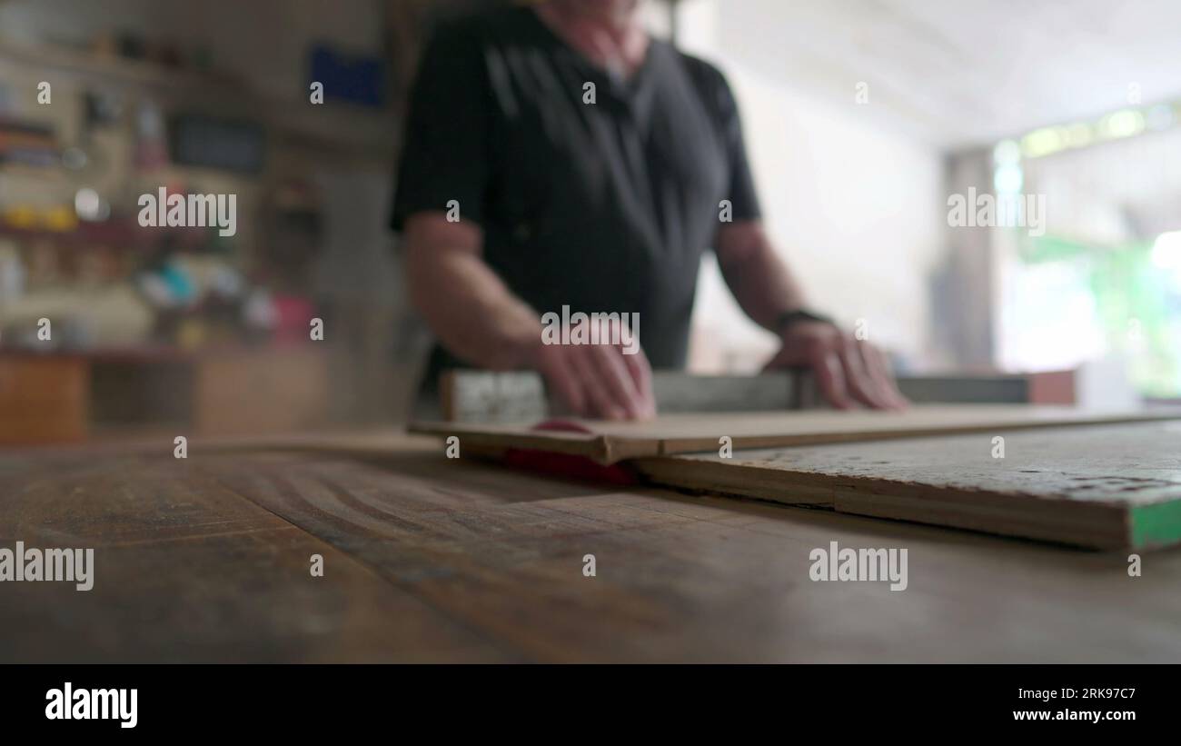 Master carpenter working in his woodwork or workshop Stock Photo - Alamy