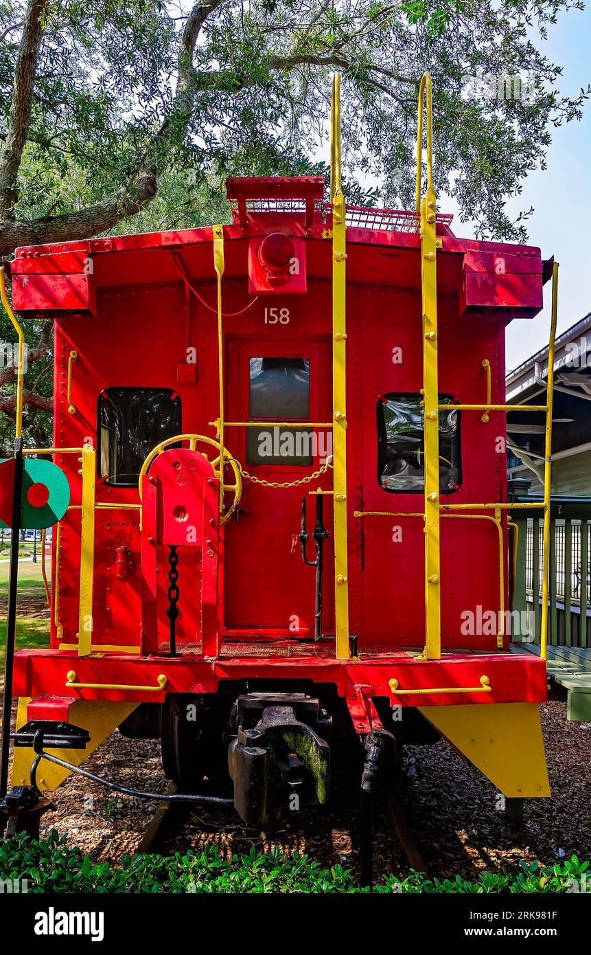 A Louisville and Nashville Railroad caboose sits outside the historic ...