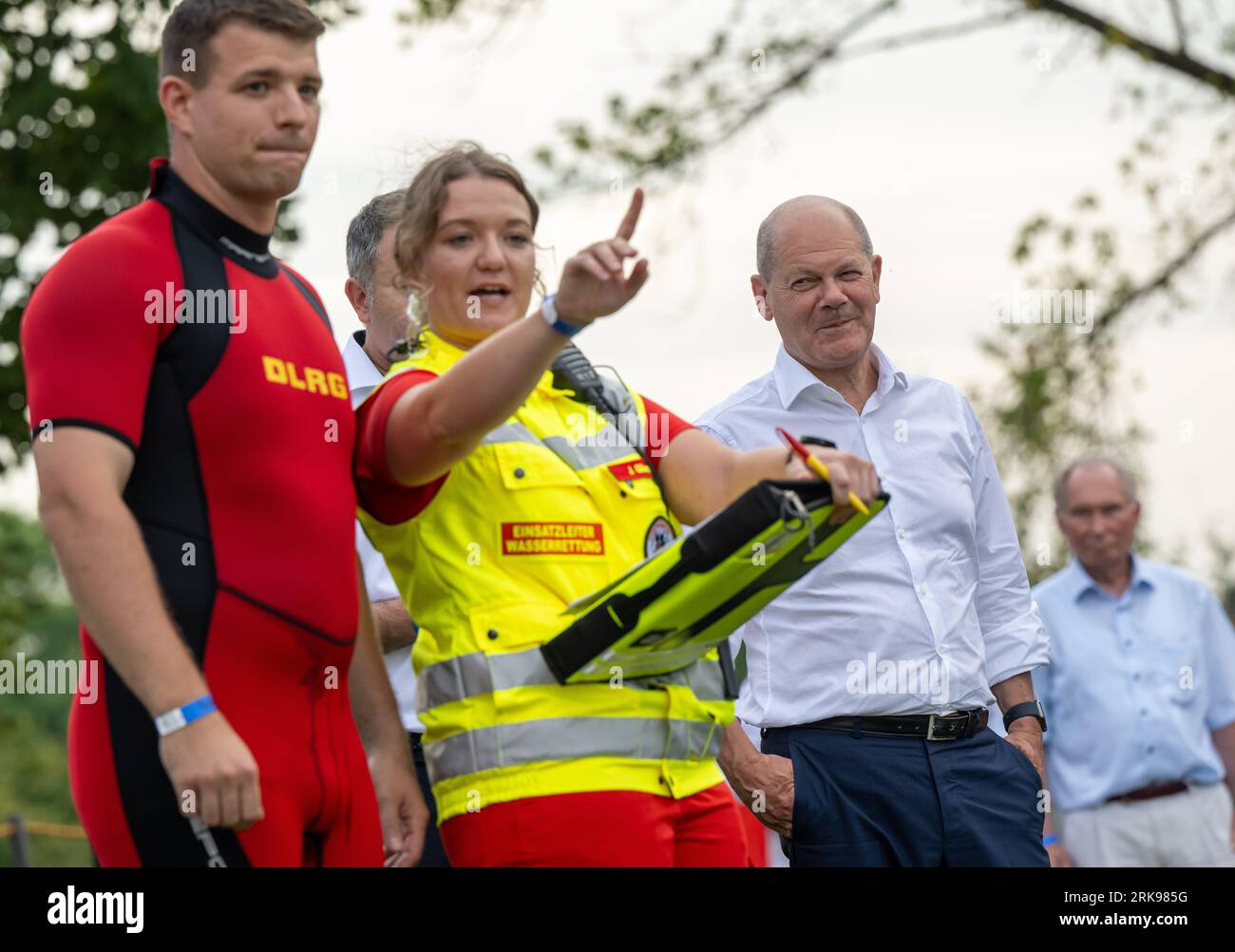 Munich, Germany. 24th Aug, 2023. German Chancellor Olaf Scholz (r) (SPD ...