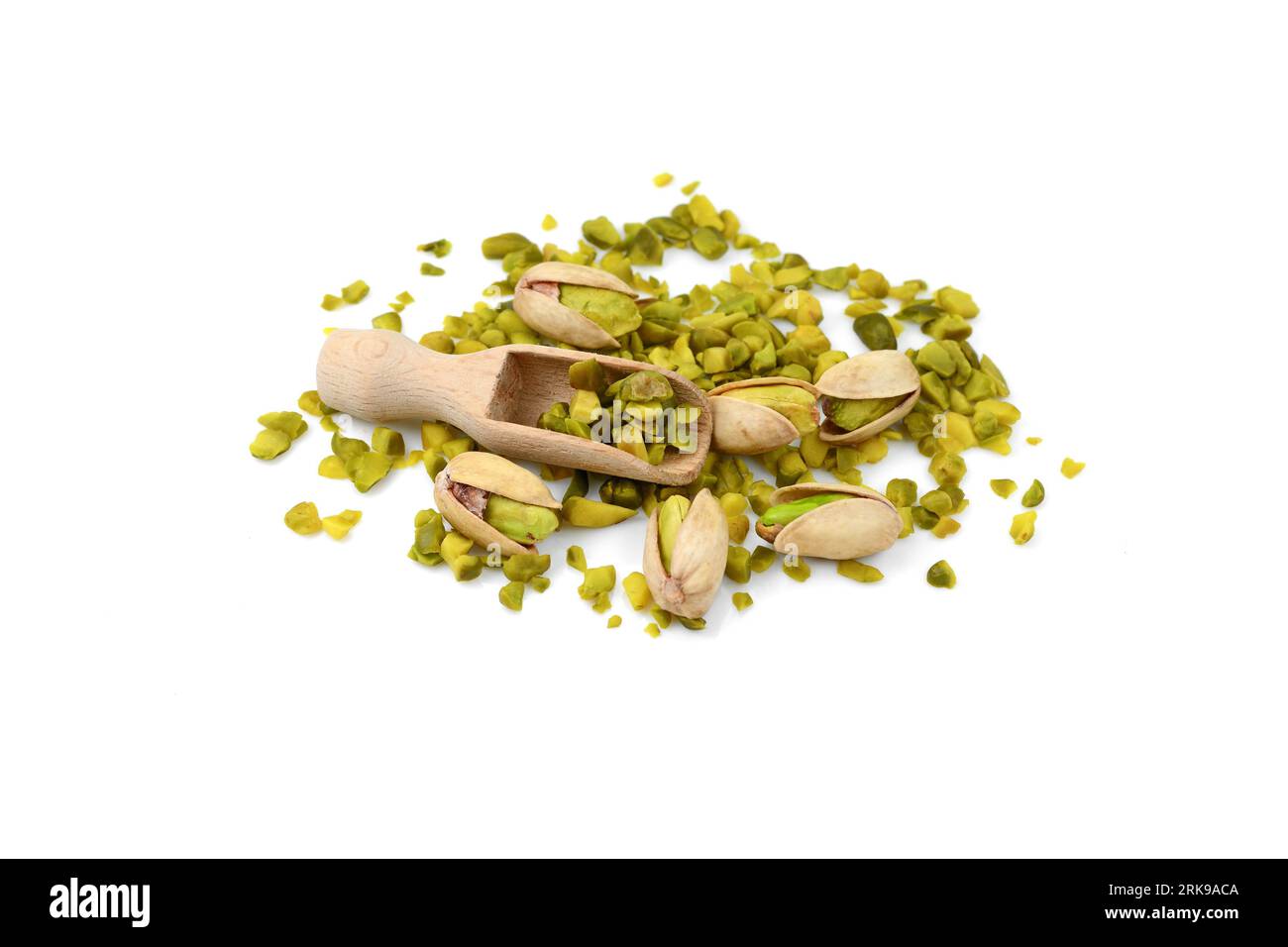 Ground, milled, crushed or granulated pistachio pile isolated on white ...