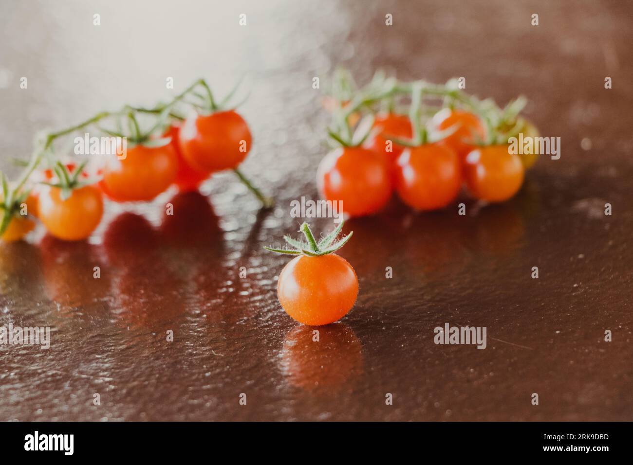 little red tomatos close up Stock Photo - Alamy