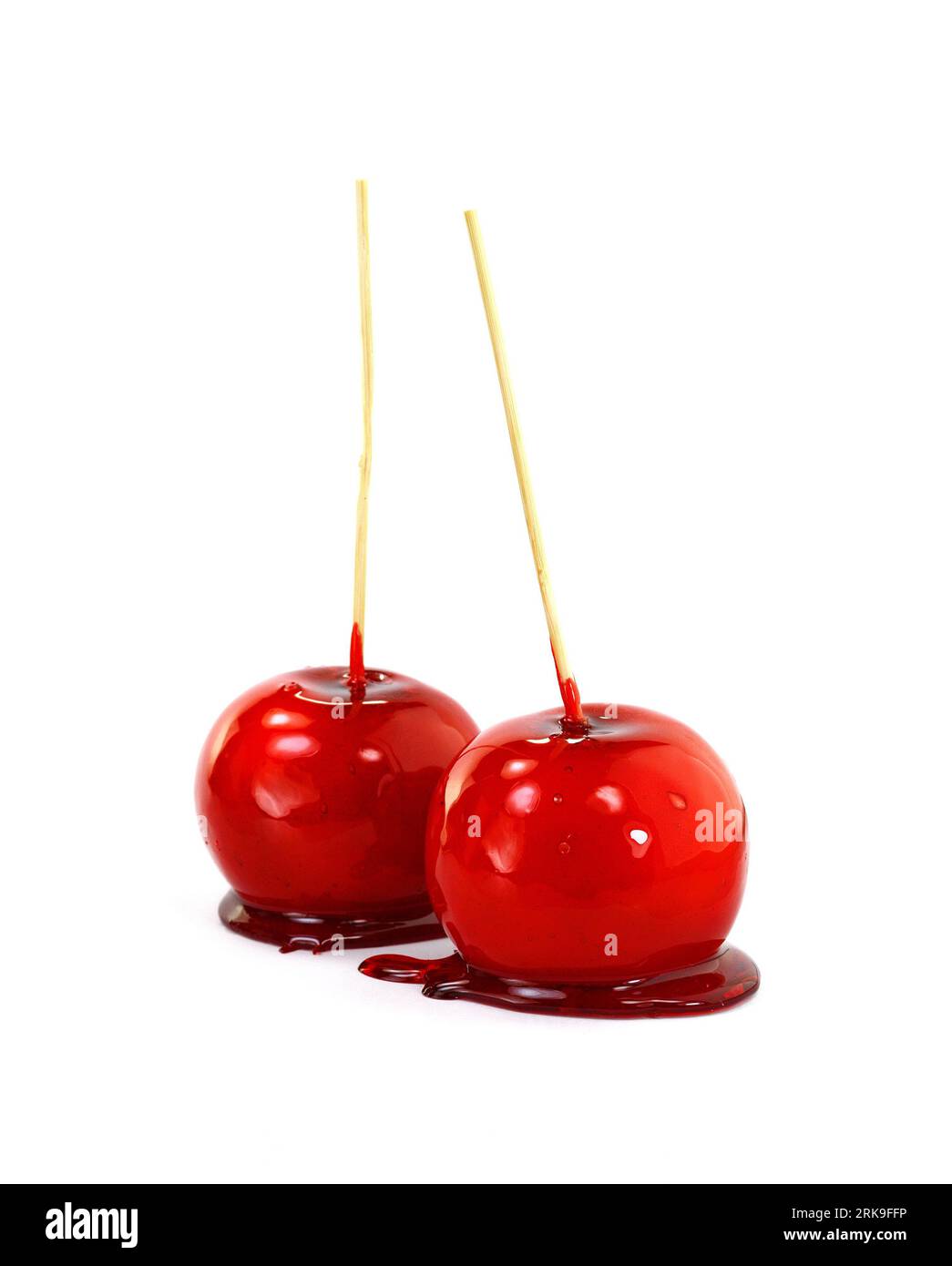 Two Toffee apple on white background Stock Photo - Alamy