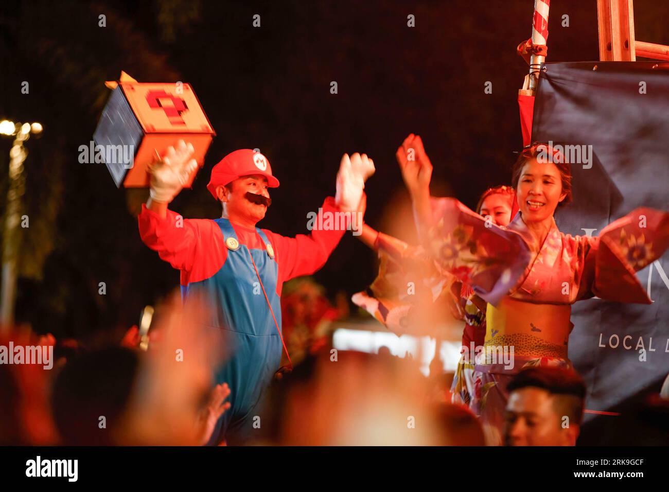 Members of the Japanese Society of Cairns lead the traditional Bon ...