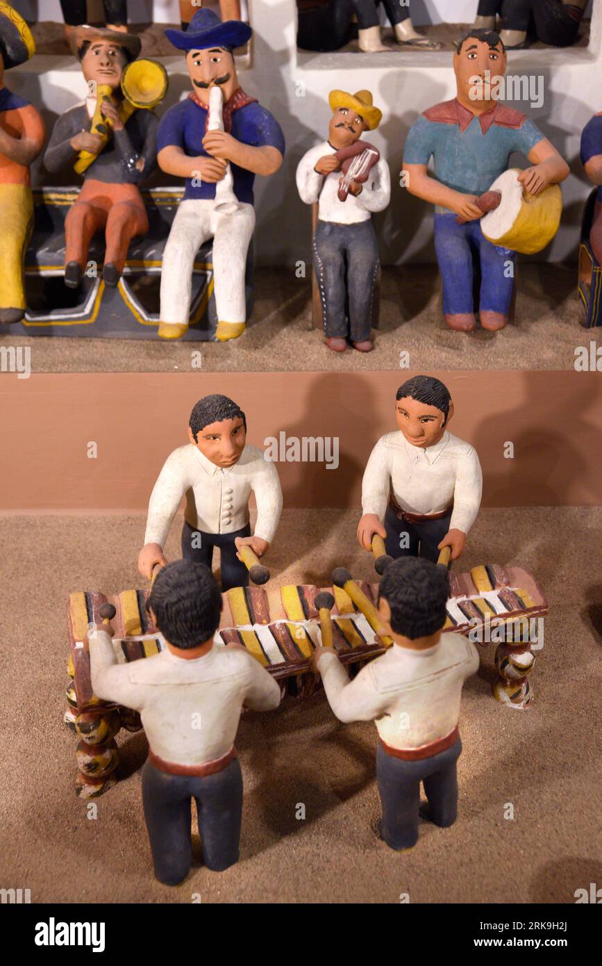 Miniature tableaus made of clay by hispanic folk artists on display at ...