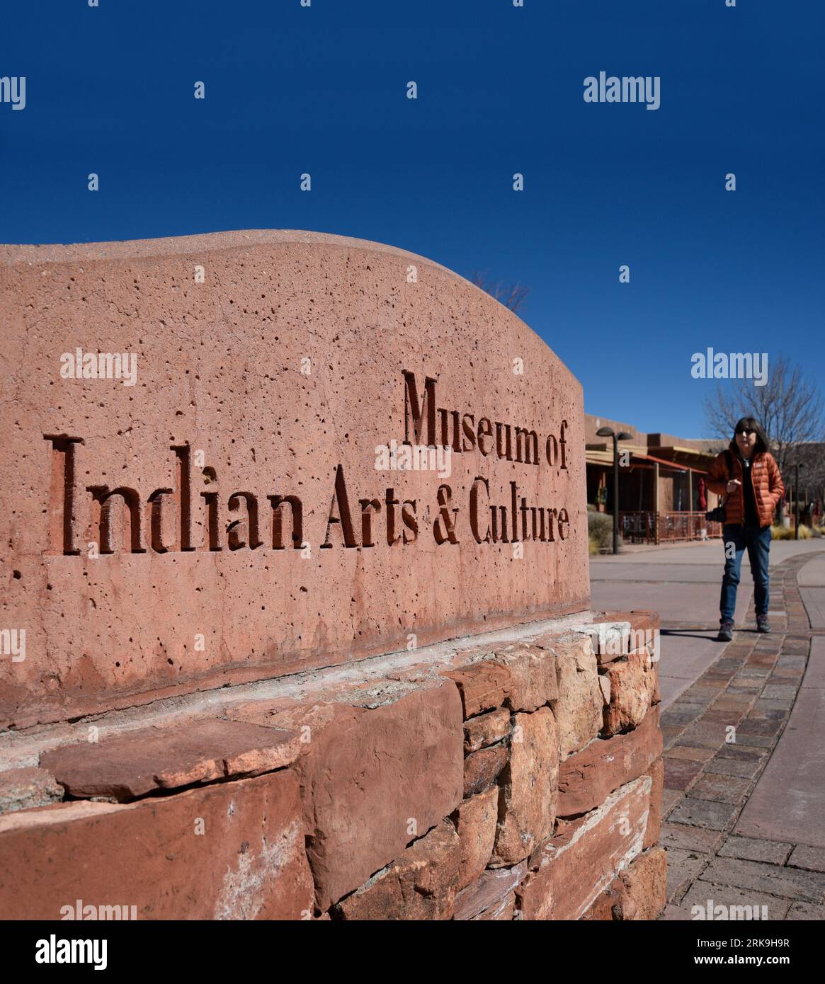 A tourist visits the Museum of Indian Arts & Culture in Santa Fe, New ...