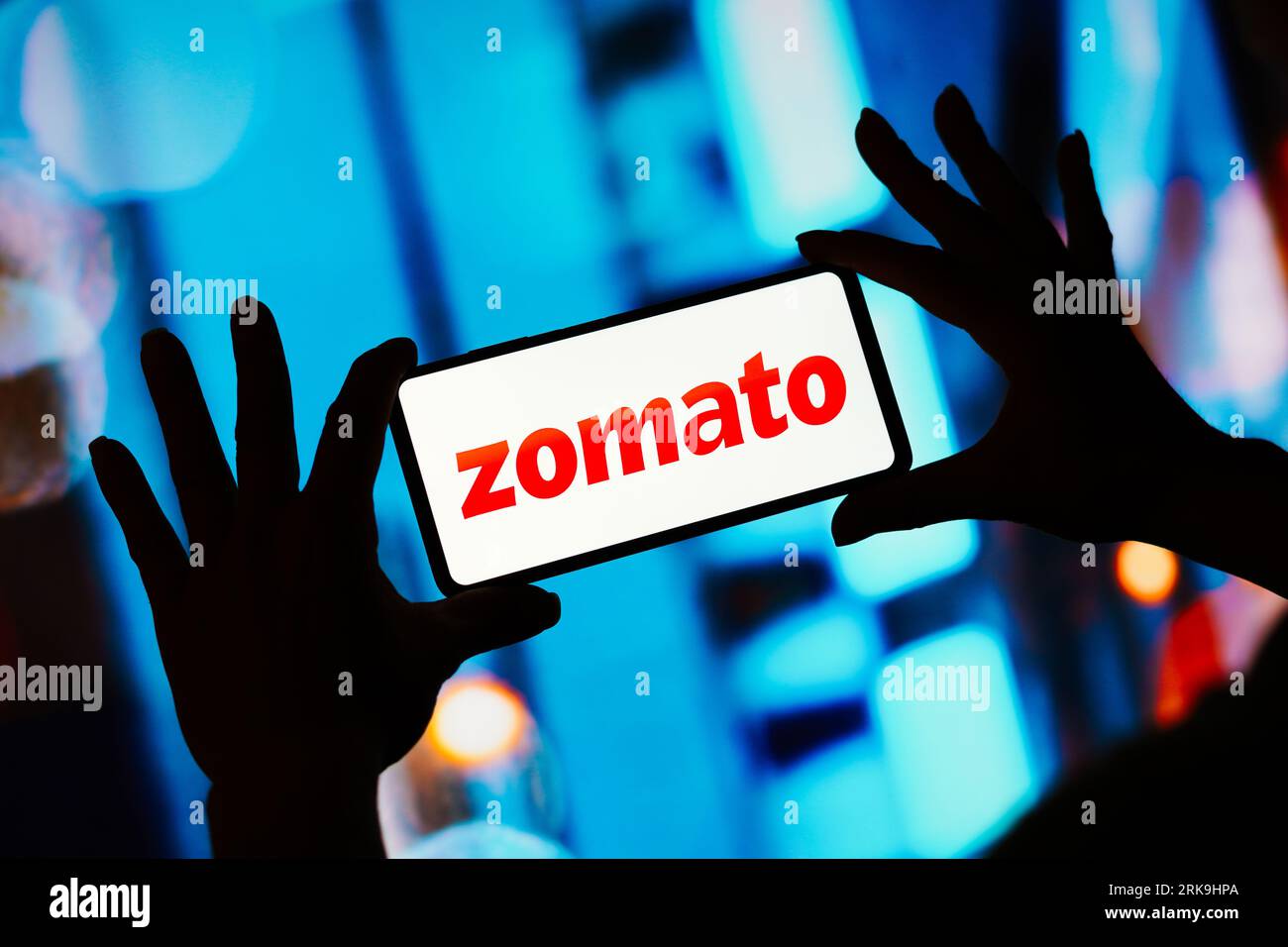 In this photo illustration, the Zomato logo seen displayed on a ...