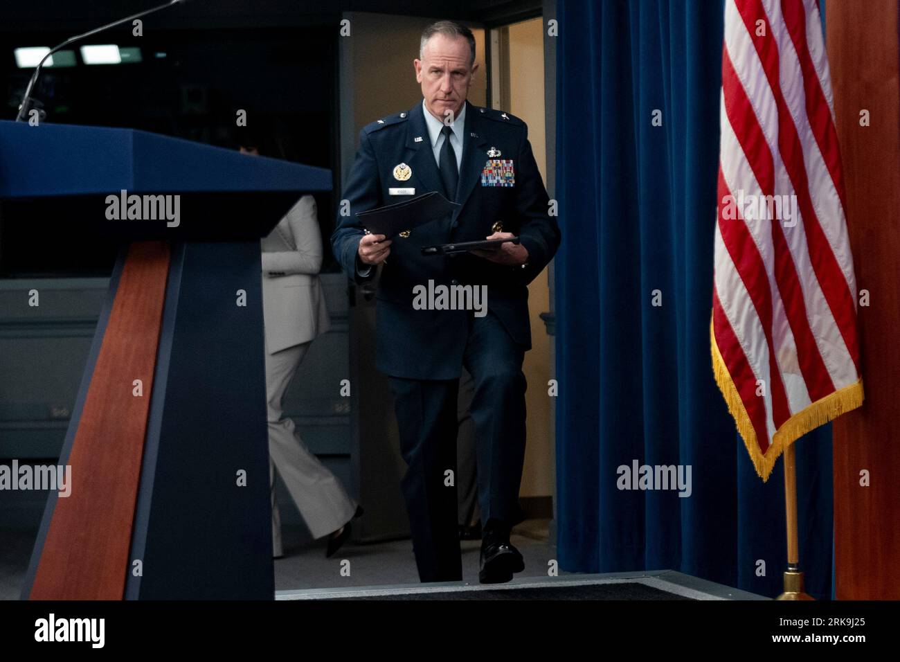 Pentagon spokesman Air Force Brig. Gen. Patrick Ryder arrives for a briefing at the Pentagon in ...