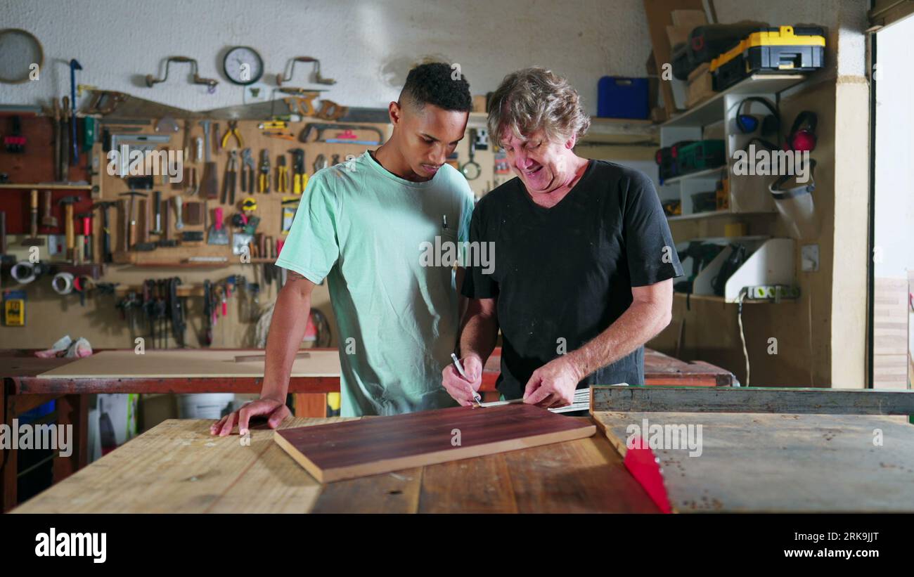 Master carpenter apprentice using hi-res stock photography and images ...