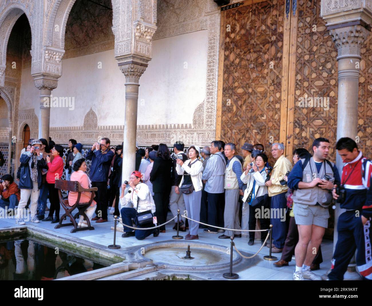 GRANADA, SPAIN- MAY 12, 2019:Tourists taking photos at the Alhambra ...