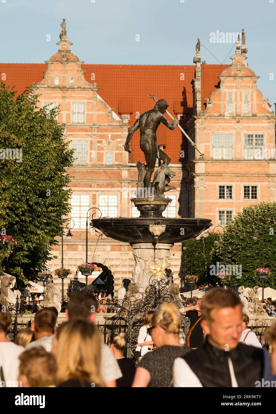 Crowd of tourists at the Neptune's Fountain statue landmark sightseeing ...
