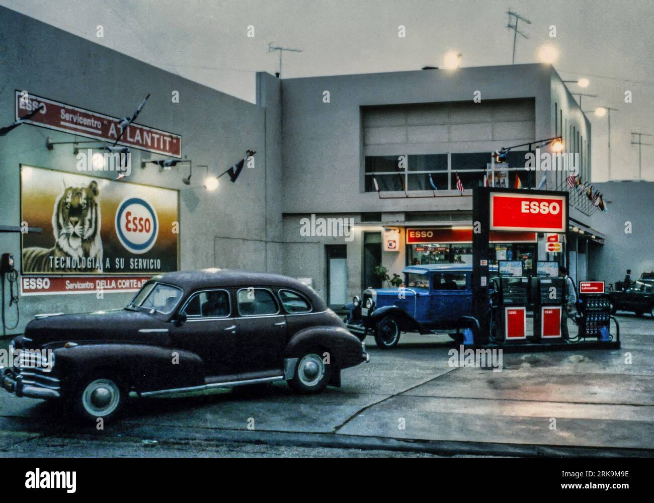 A 1946 Chevroley Stylemaster pulling out of a gas station in Paysandu ...