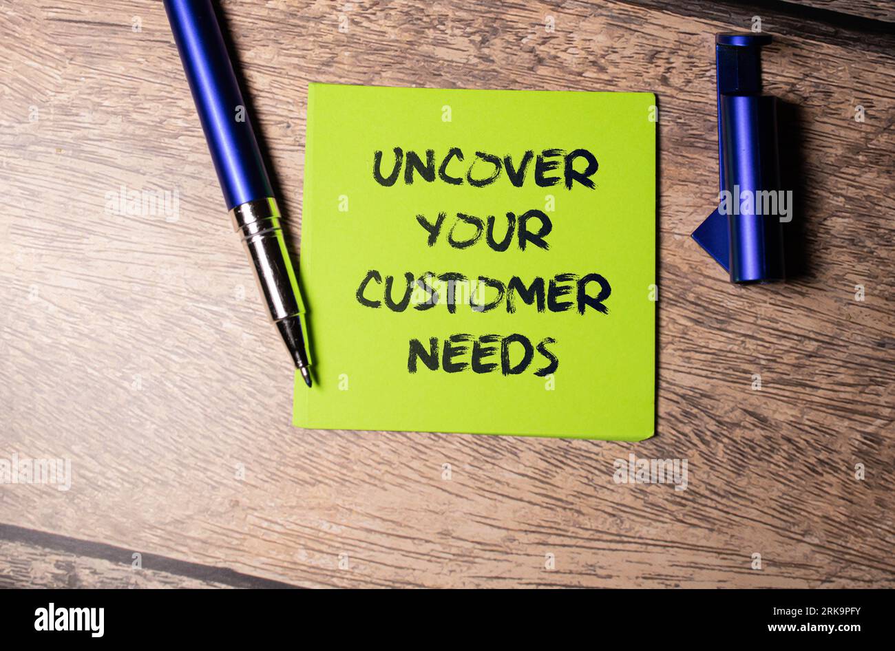 Uncover Your Customer Needs . gray and yellow background. text on white ...