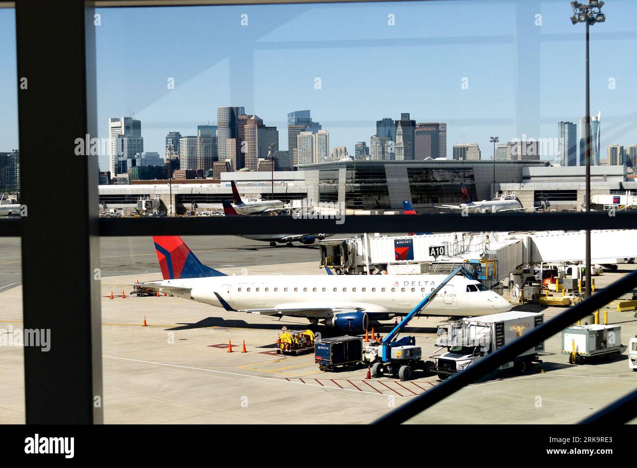 Planes are seen on the tarmac at Boston Logan International Airport ...