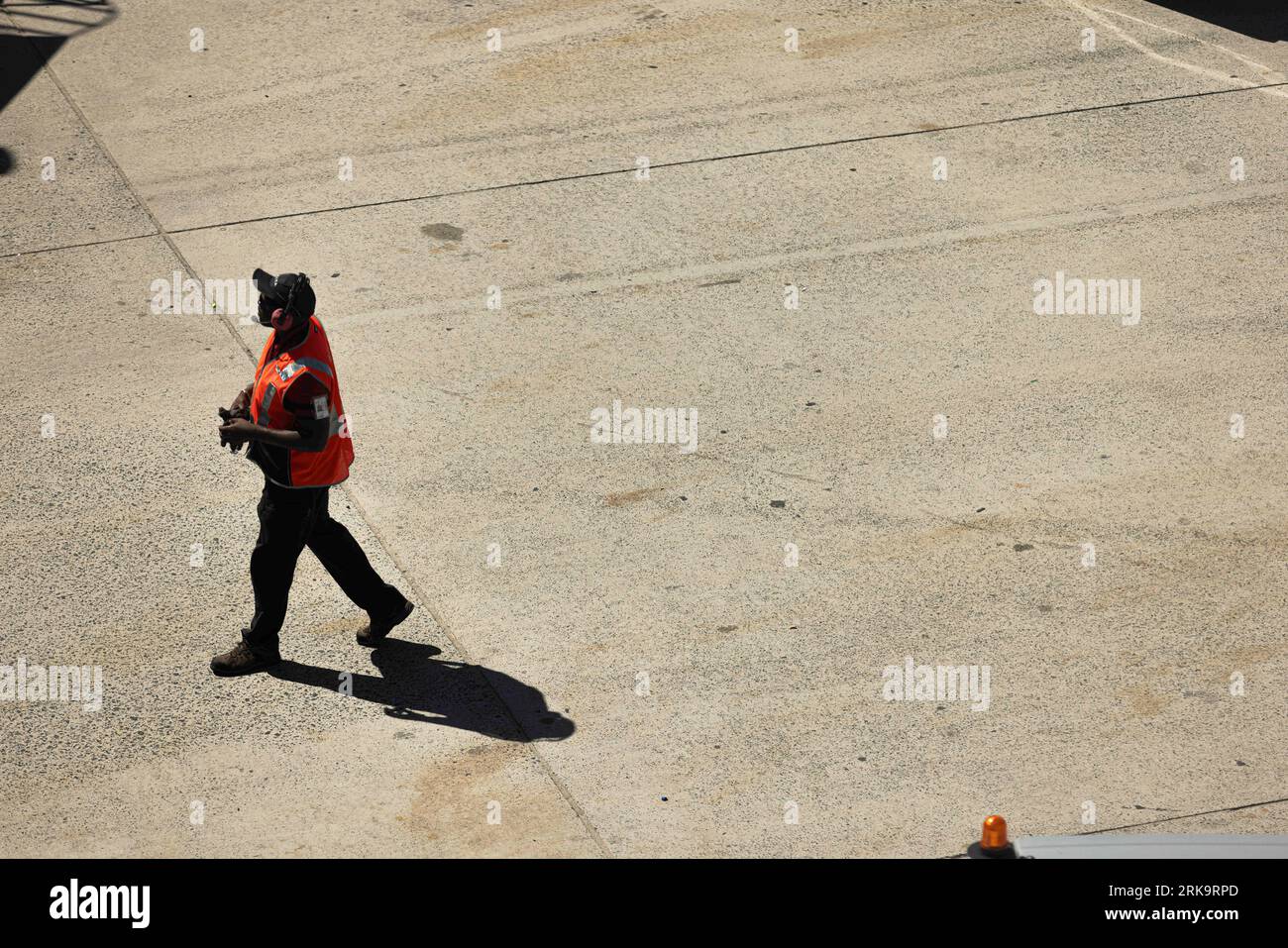 A ground crew member is seen at Logan Airport in Boston Stock Photo - Alamy