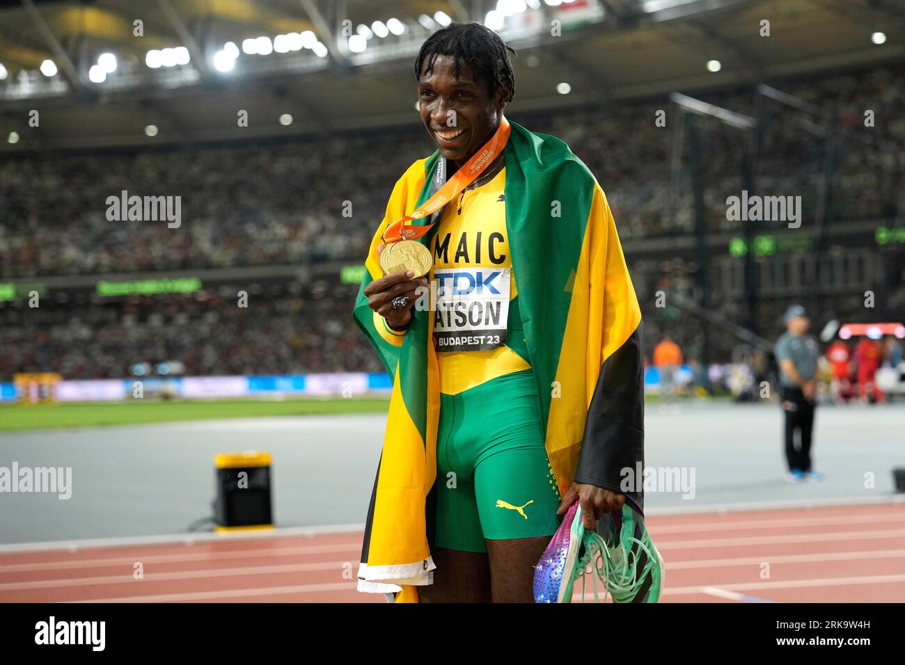 Antonio Watson, of Jamaica, poses after winning the men's 400-meters ...