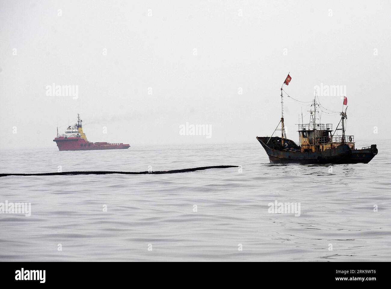 Oil boom on sea around hi-res stock photography and images - Alamy