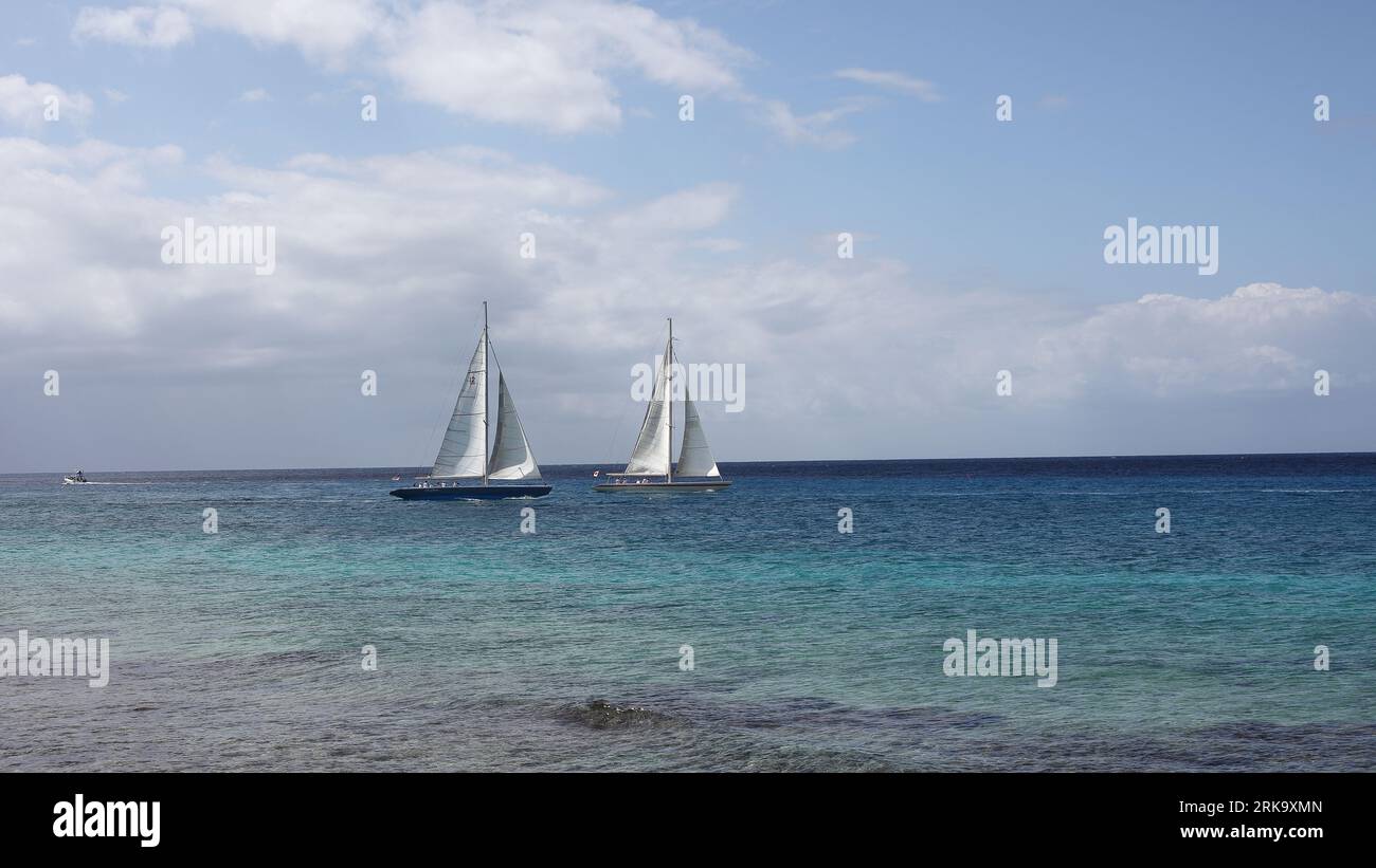 Two sail boats in warm Caribbean waters near Cozumel Stock Photo - Alamy