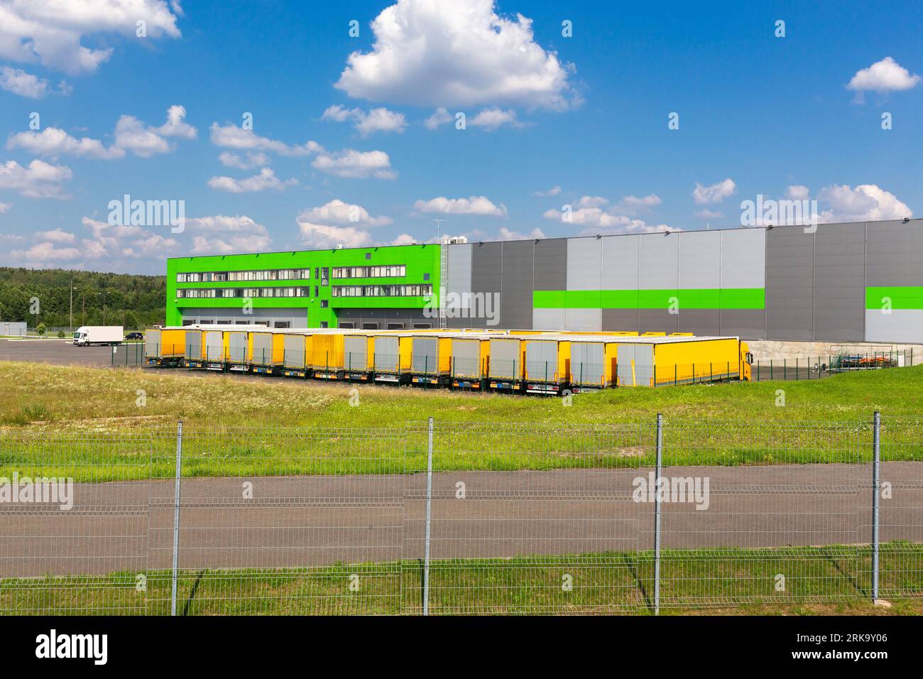 Distribution warehouse with trucks of different capacity ...