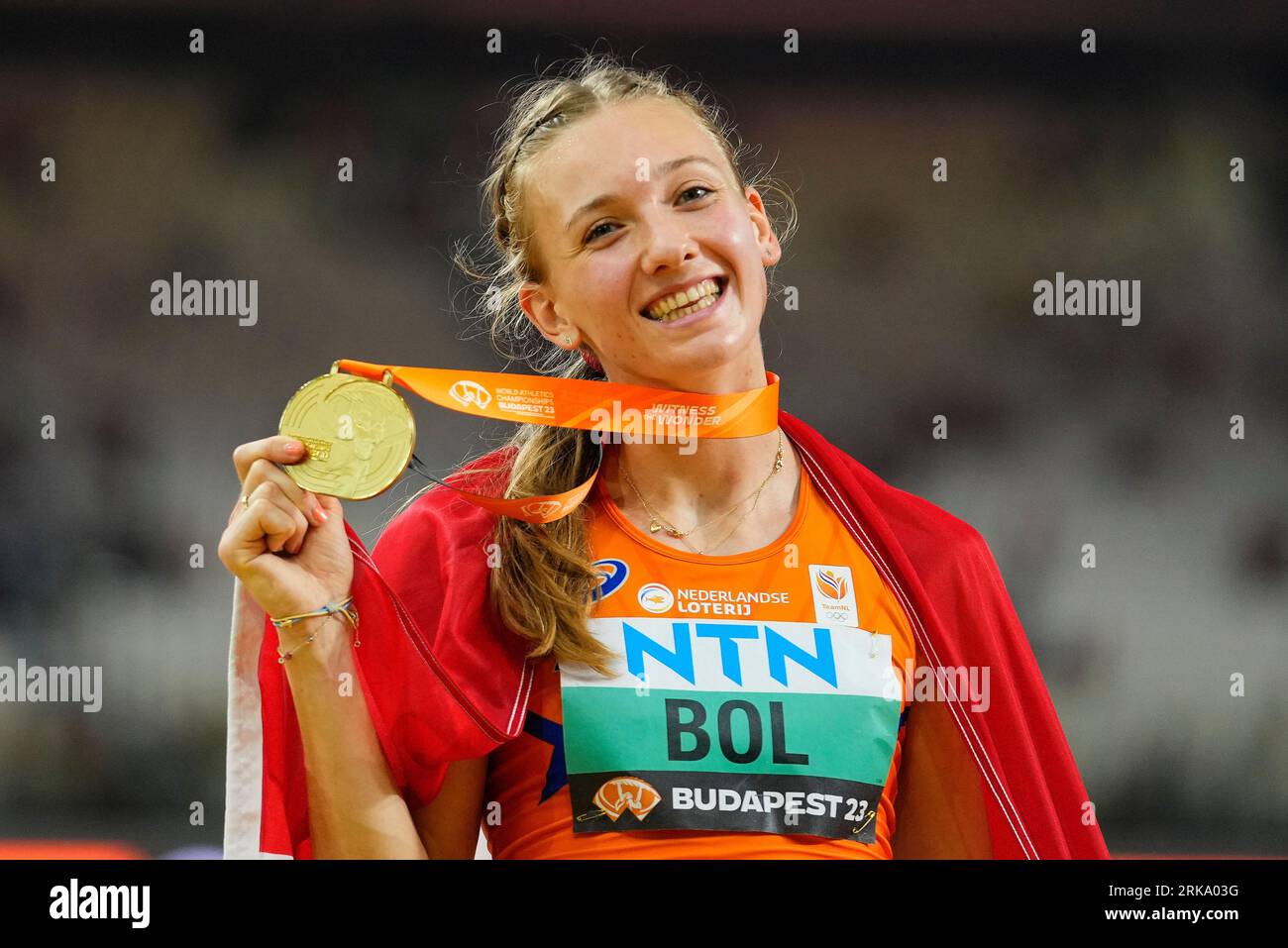 Femke Bol, of the Netherlands, gold, celebrates after the final of the ...