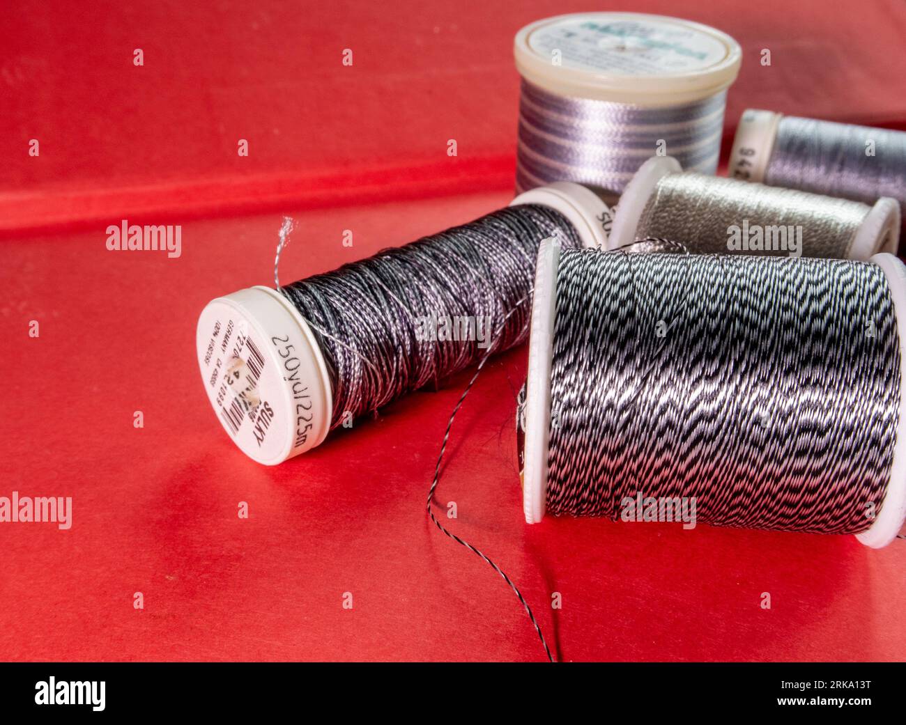 Silver metallic threads hi-res stock photography and images - Alamy