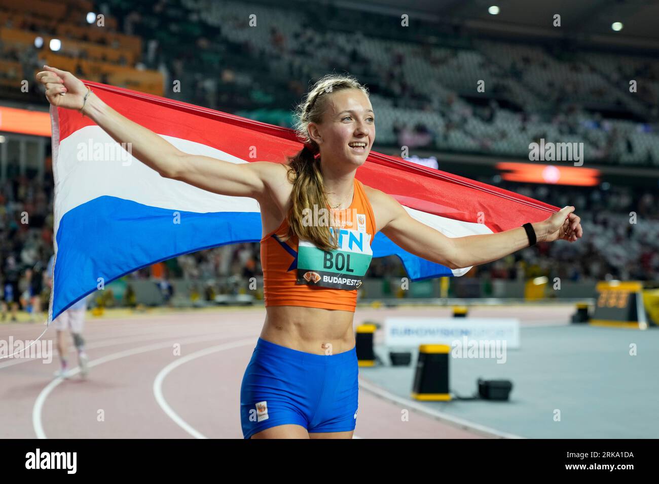 Femke Bol, of the Netherlands celebrates after winning the gold medal ...