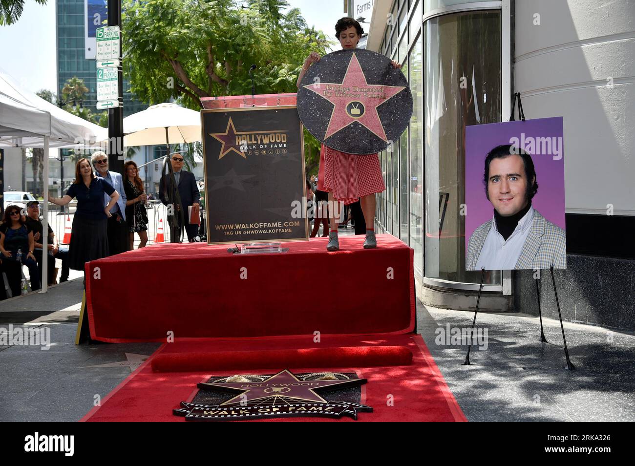 Kristen Schaal speaks at a ceremony honoring the late comedian and ...