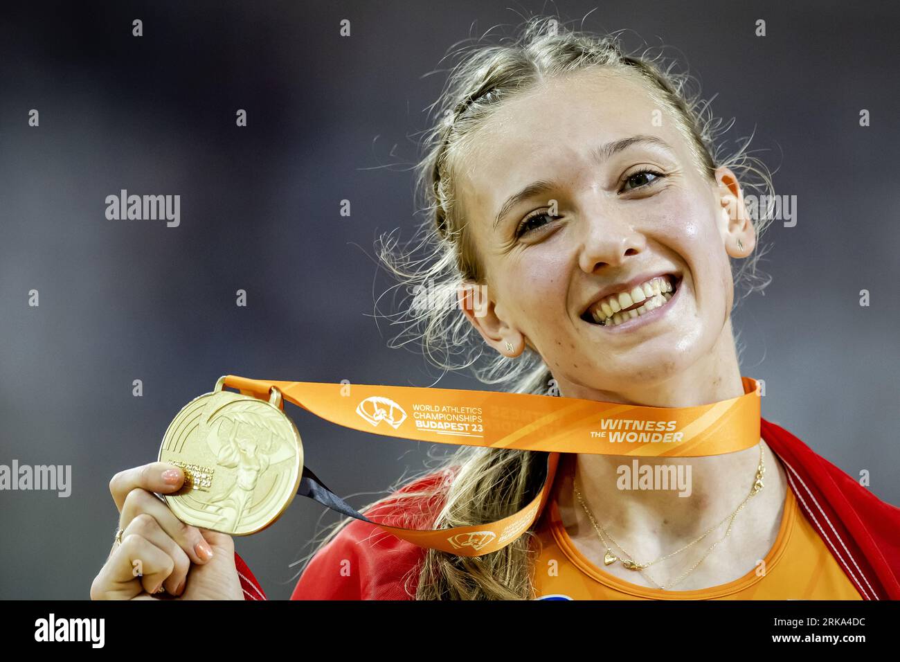 BUDAPEST - Femke Bol with a gold medal after winning the final in the ...