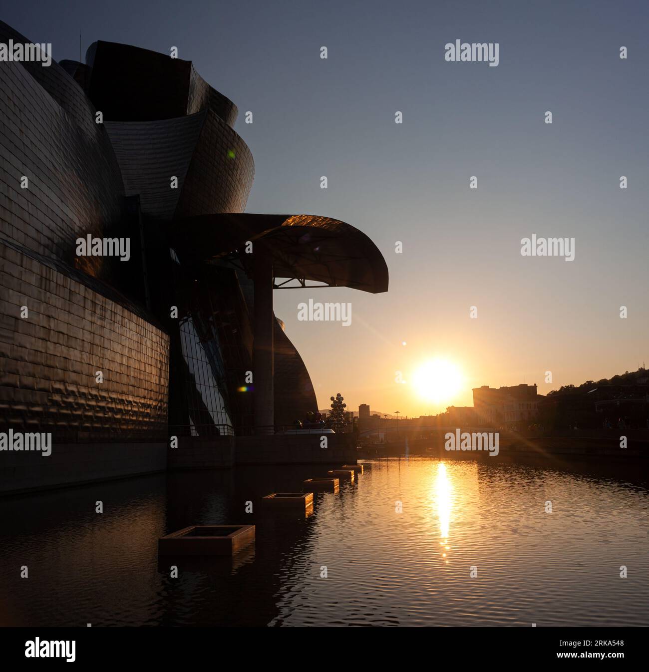 Bilbao, Spain - August 02, 2022: View at sunset of the Guggenheim ...