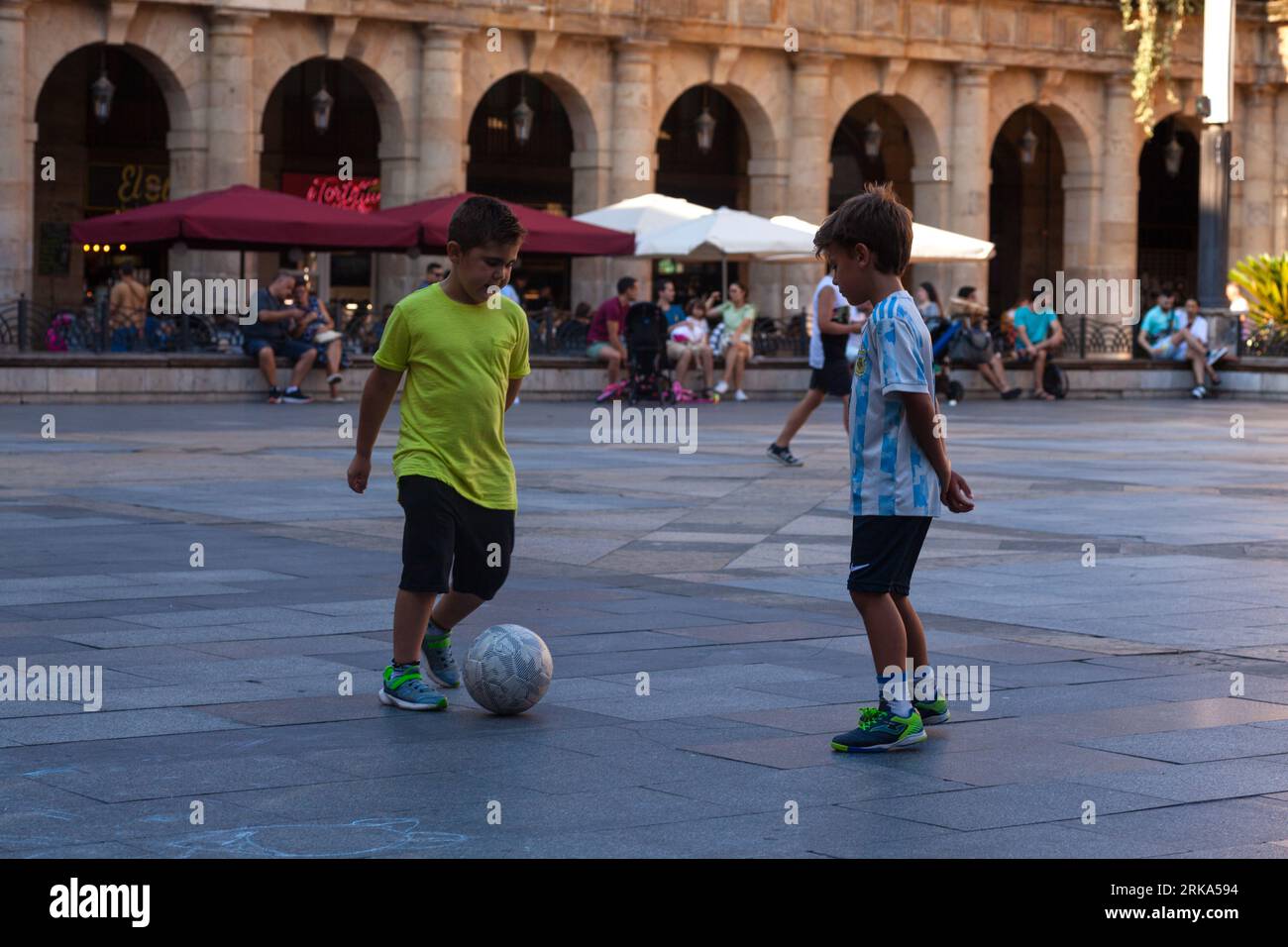 Bilbao, Spain - August 02, 2022: Two glad children playing football on ...