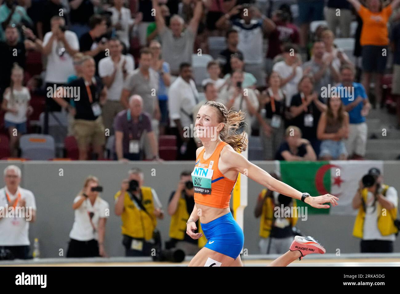 Femke Bol, of the Netherlands crosses the finish line to win the gold ...