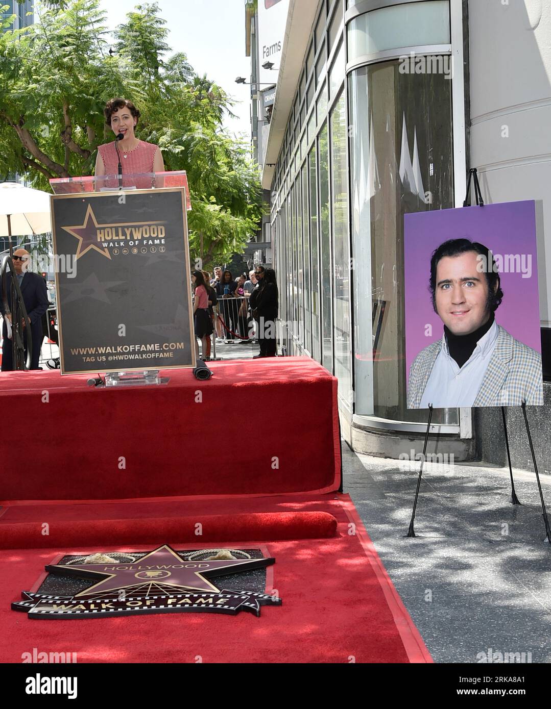 Kristen Schaal speaks at a ceremony honoring the late comedian and ...