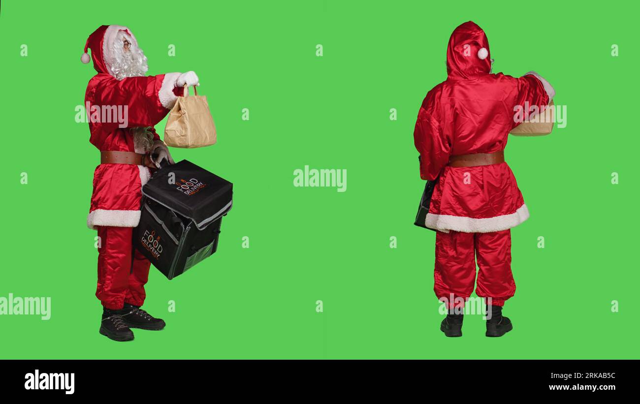 Father christmas delivery in paper bag, person dressed as santa claus ...